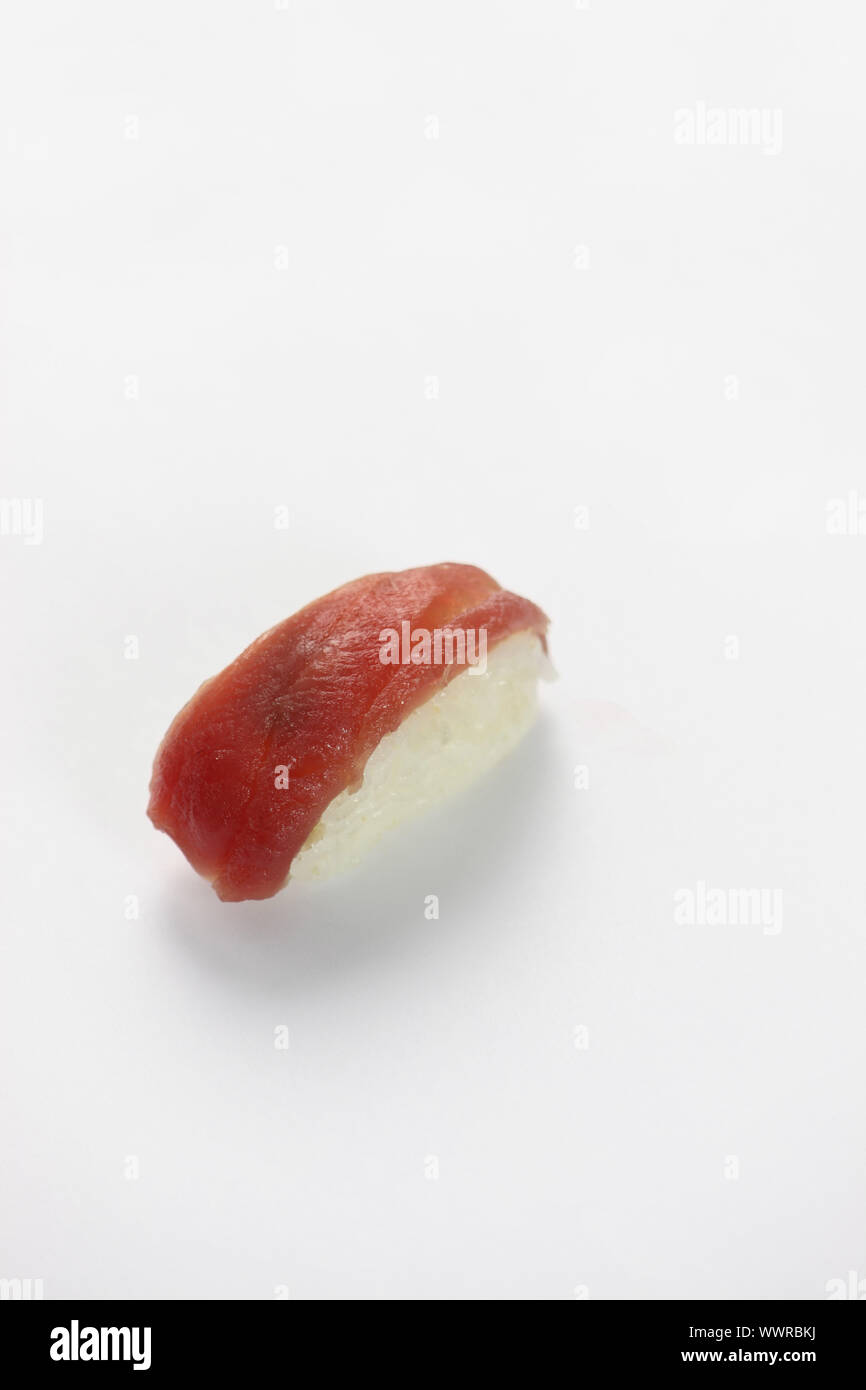 Raw fish on ball of rice Stock Photo - Alamy