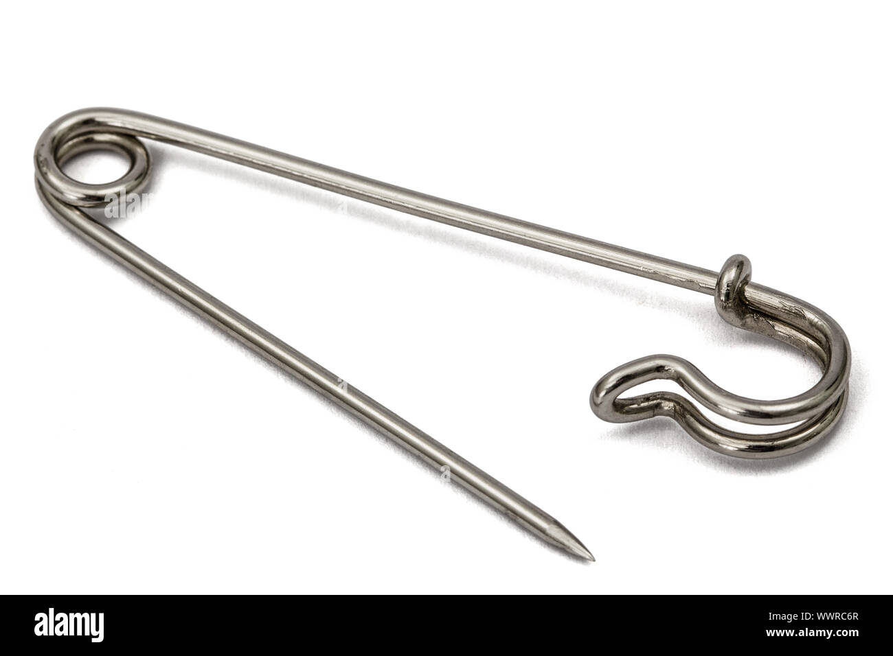 Safety pin, isolated on white background, with clipping path Stock ...