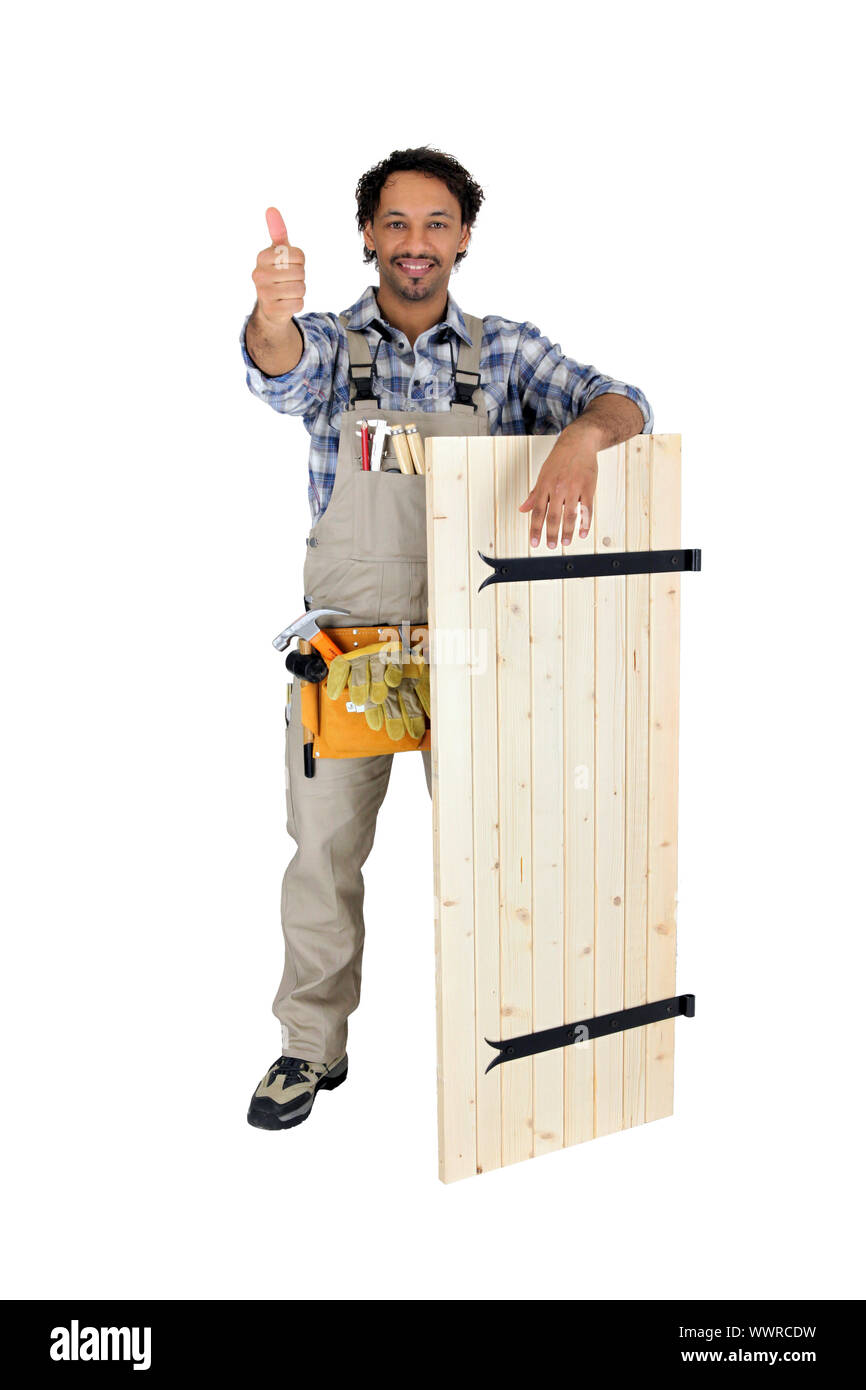 Carpenter giving the thumbs-up Stock Photo - Alamy