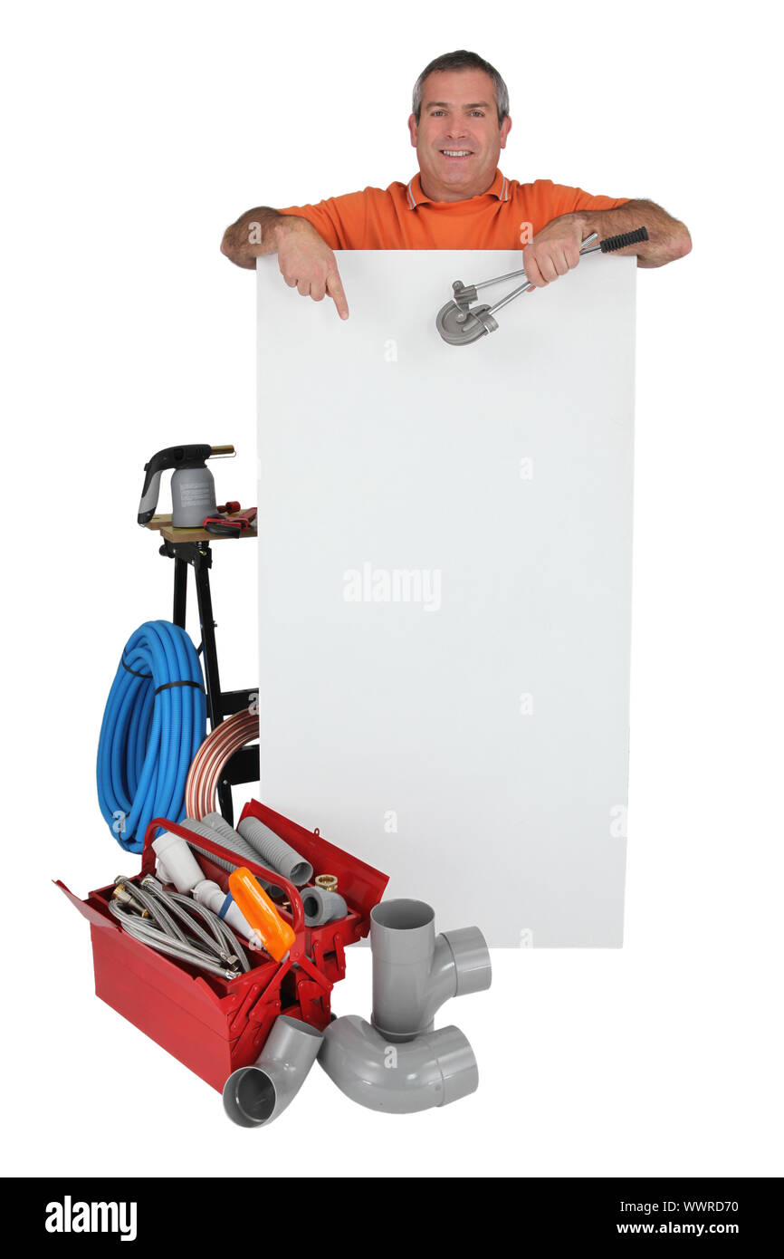 plumber showing wall Stock Photo - Alamy