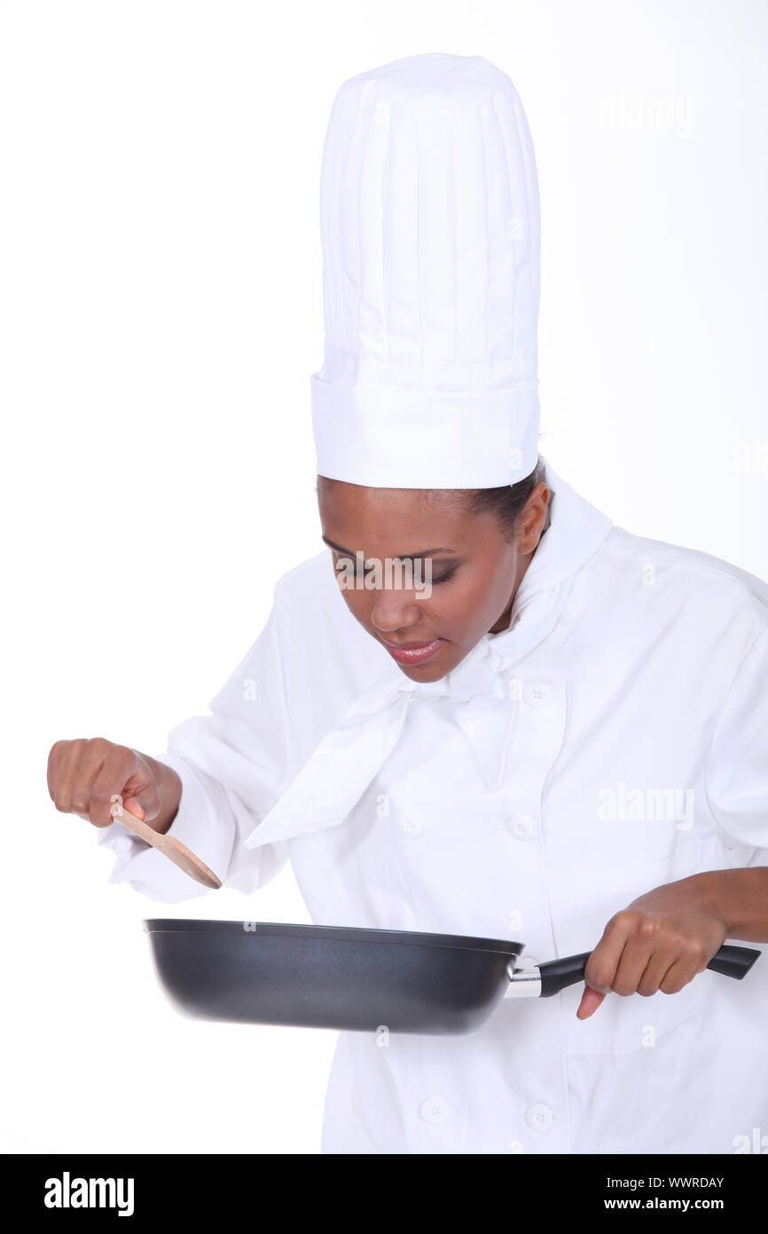 Cook with pan Stock Photo - Alamy