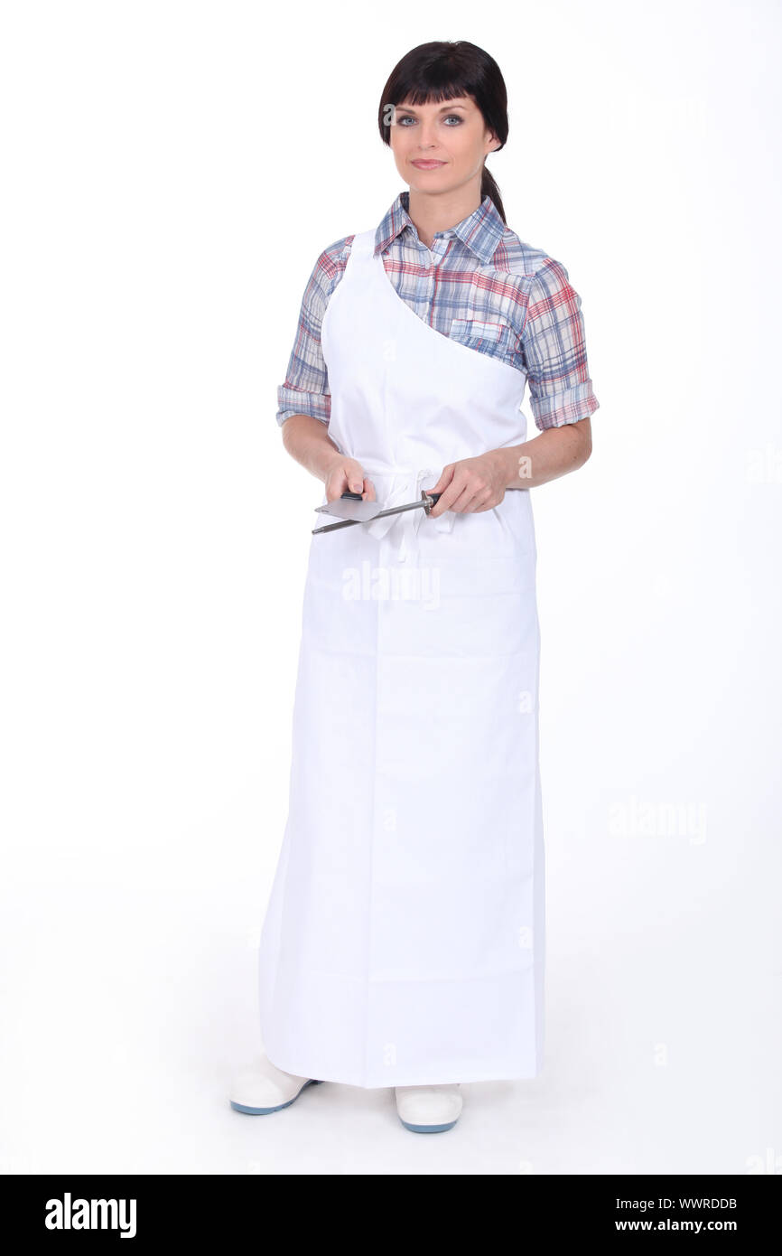Butcher uniform sharpening knife hi-res stock photography and images ...