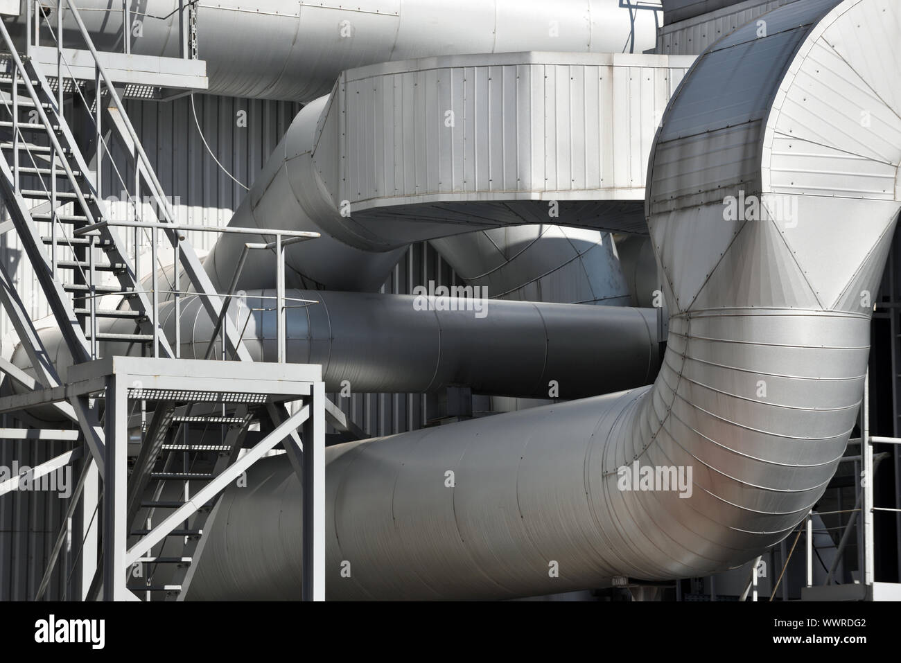 Metal constructions of a modern industrial power plant Stock Photo - Alamy
