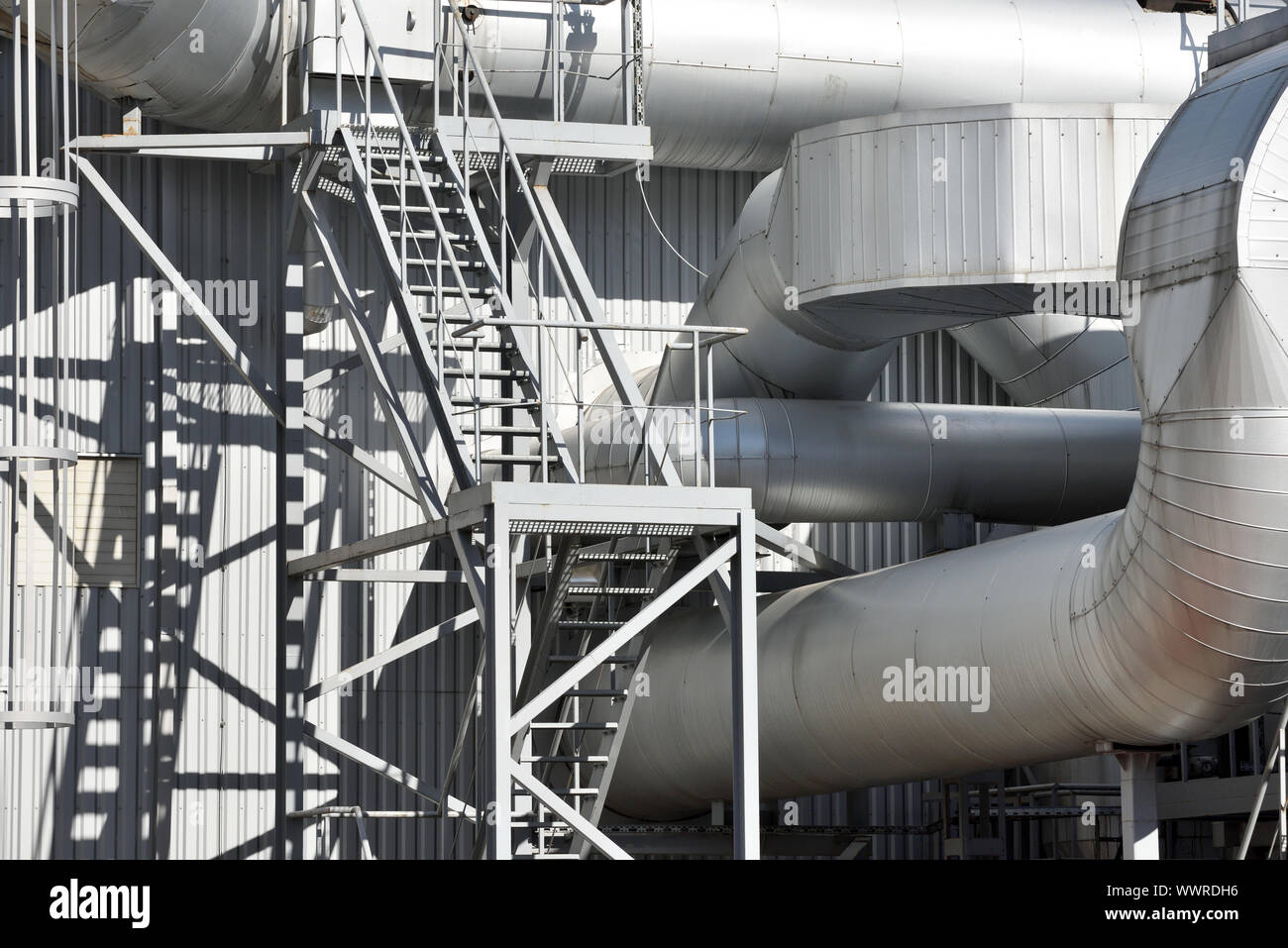 Metal constructions of a modern industrial power plant Stock Photo - Alamy