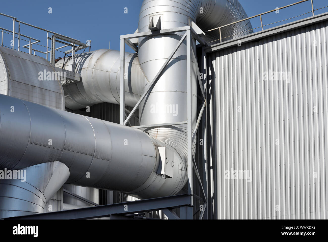 Metal constructions of a modern industrial power plant Stock Photo - Alamy