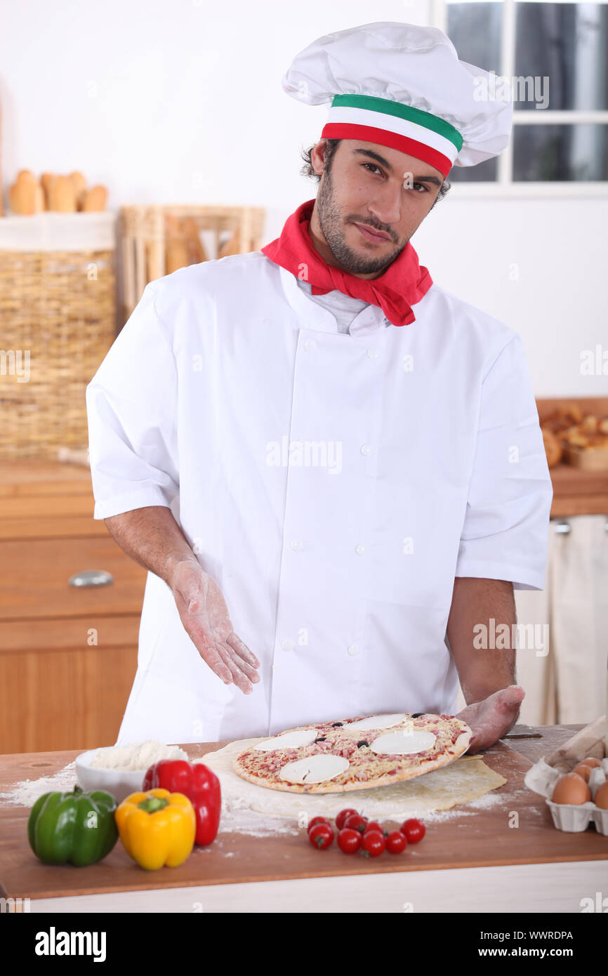 Chef making pizza Stock Photo - Alamy