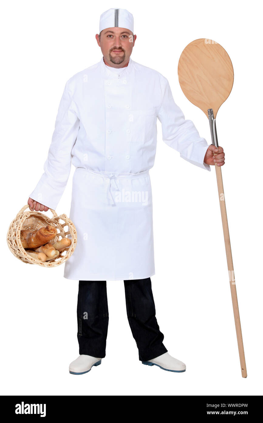 Baker with basket and paddle Stock Photo - Alamy