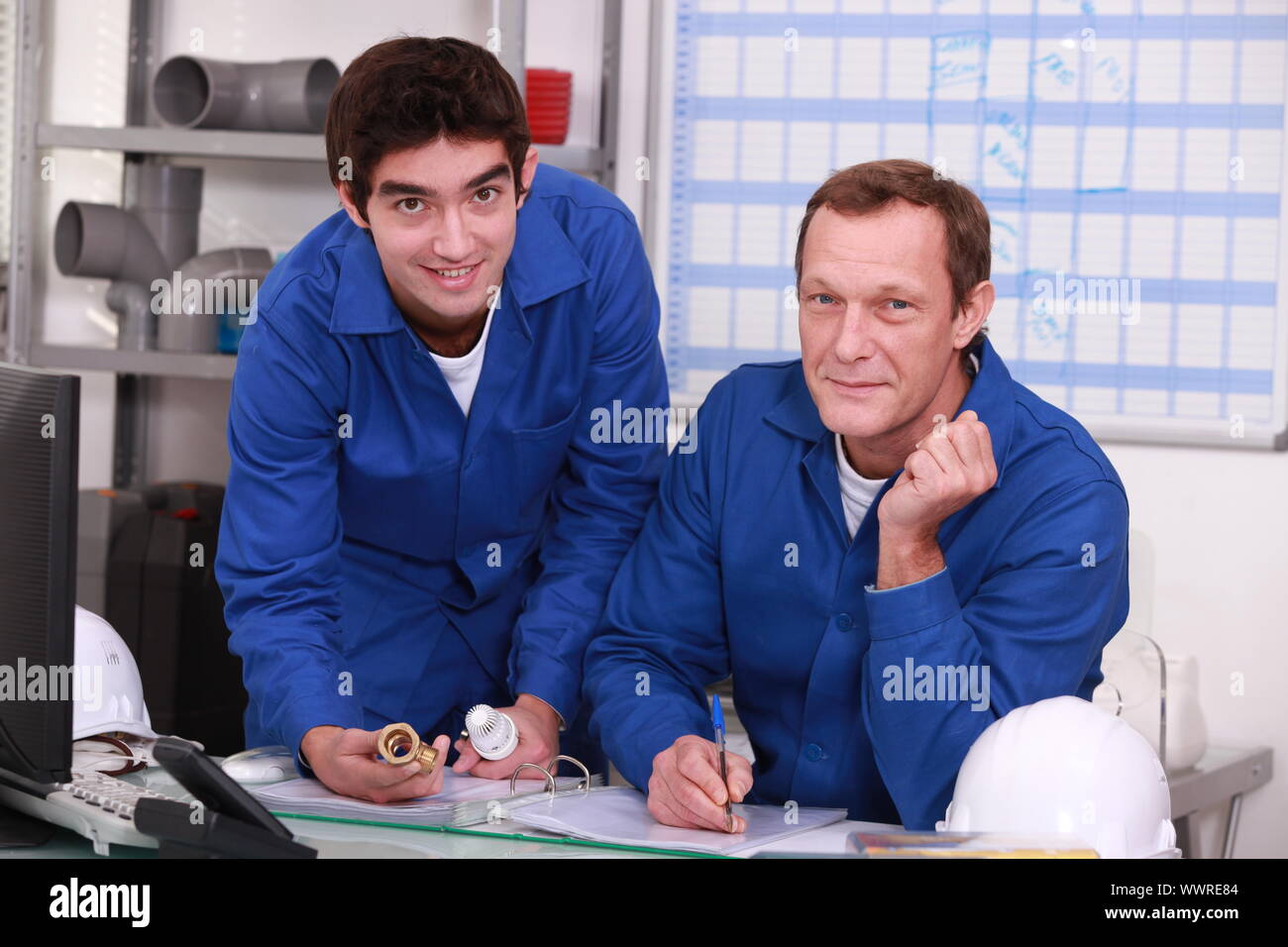 Two depot workers Stock Photo - Alamy