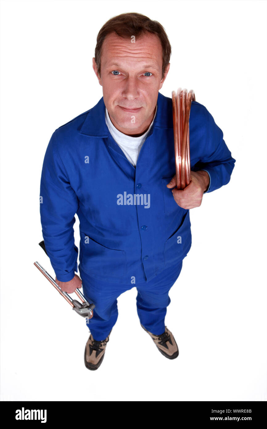 Workman standing on white background Stock Photo - Alamy