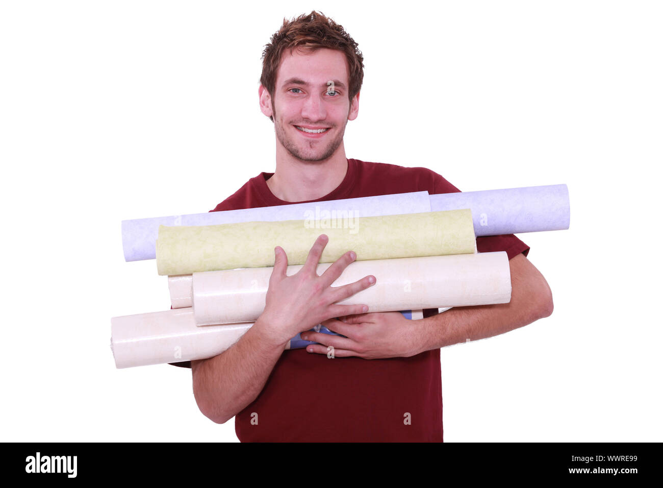 Man with rolls of wallpaper Stock Photo - Alamy