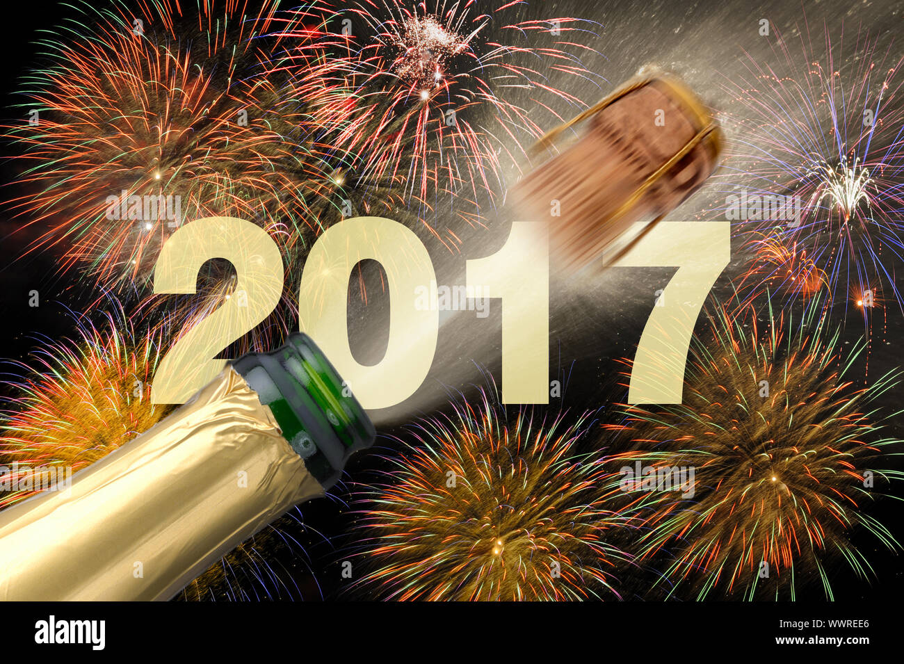 Champagne with flying cork and fireworks for New Year 2017 Stock Photo ...