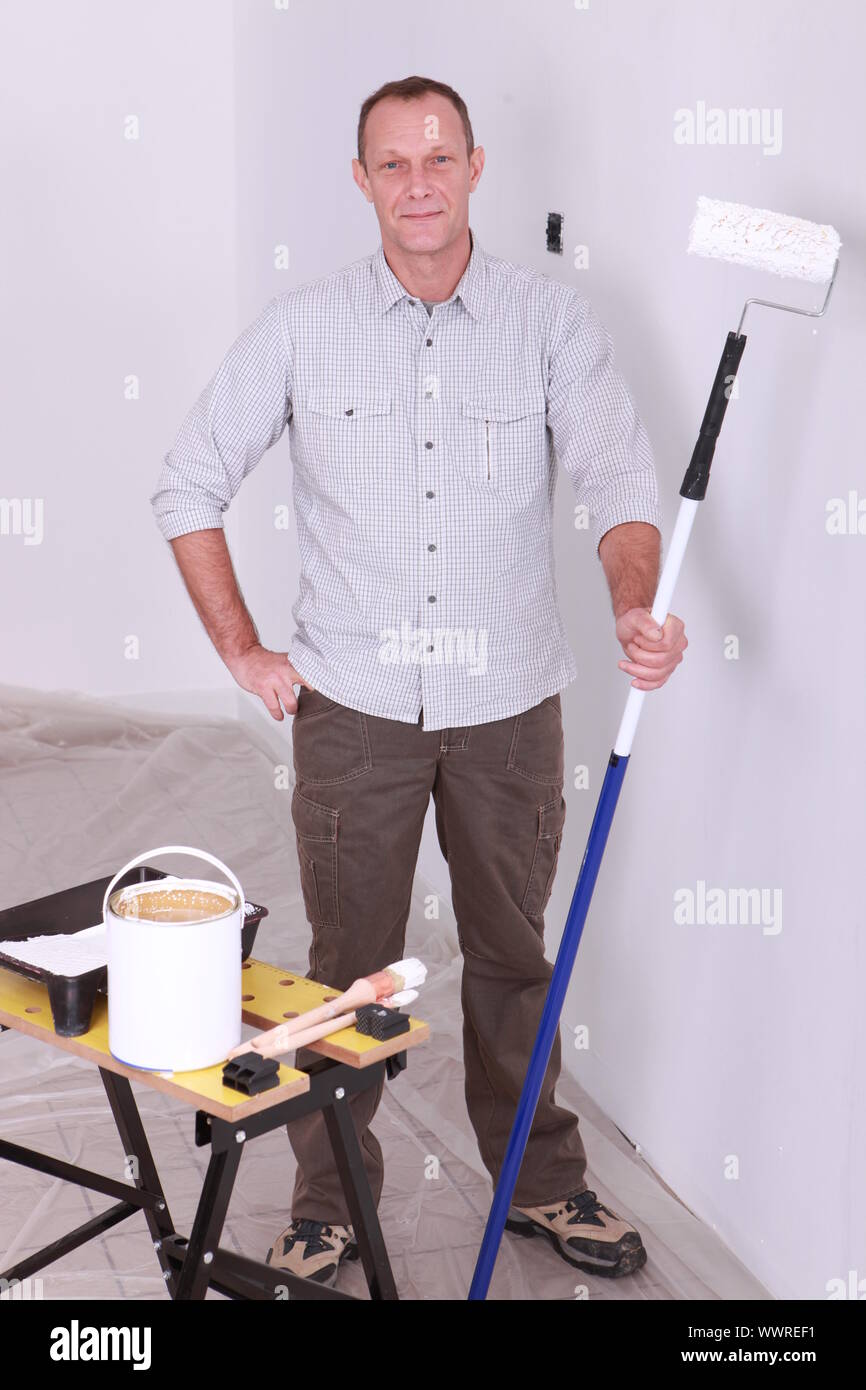 Image horizontal with roller painter Stock Photo - Alamy