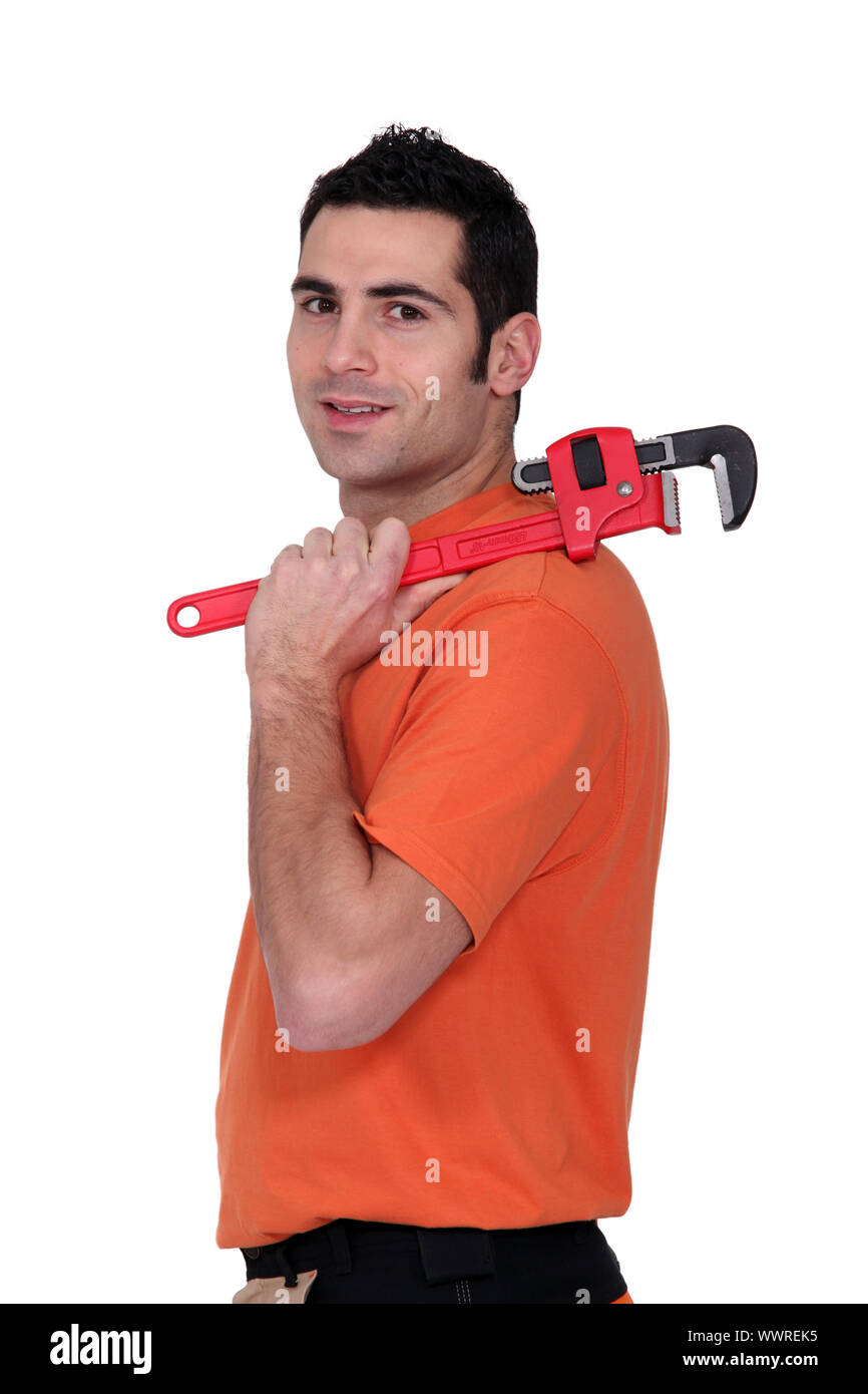 craftsman holding a spanner Stock Photo - Alamy