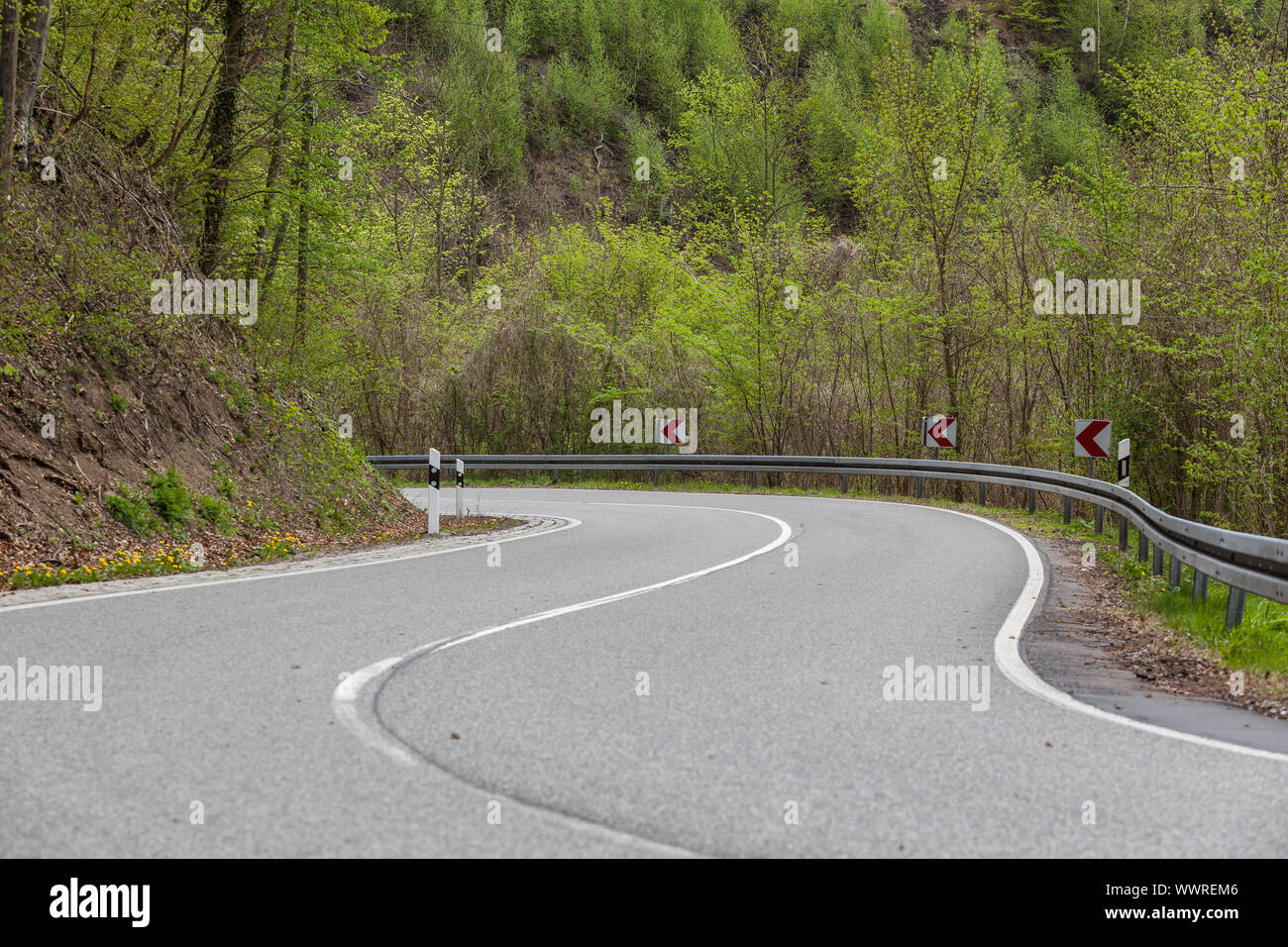 Curvy country road Stock Photo - Alamy