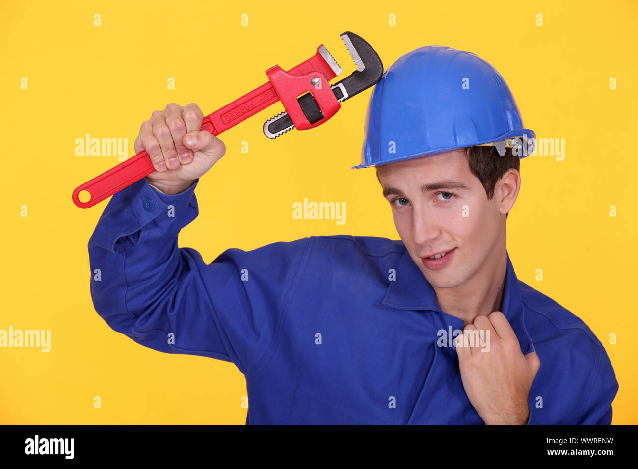 Worker with wrench Stock Photo - Alamy