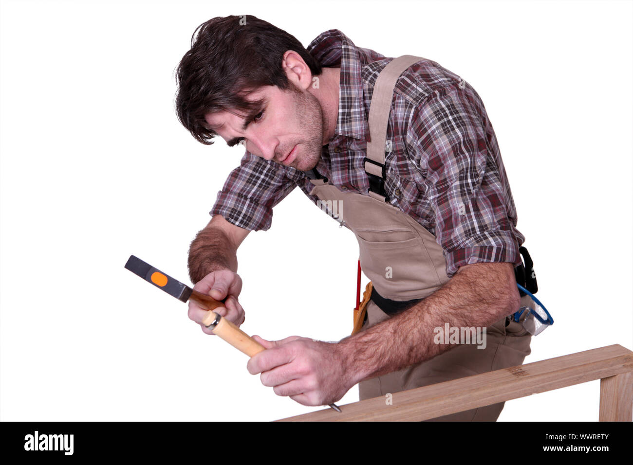 carpenter at work using hammer Stock Photo - Alamy