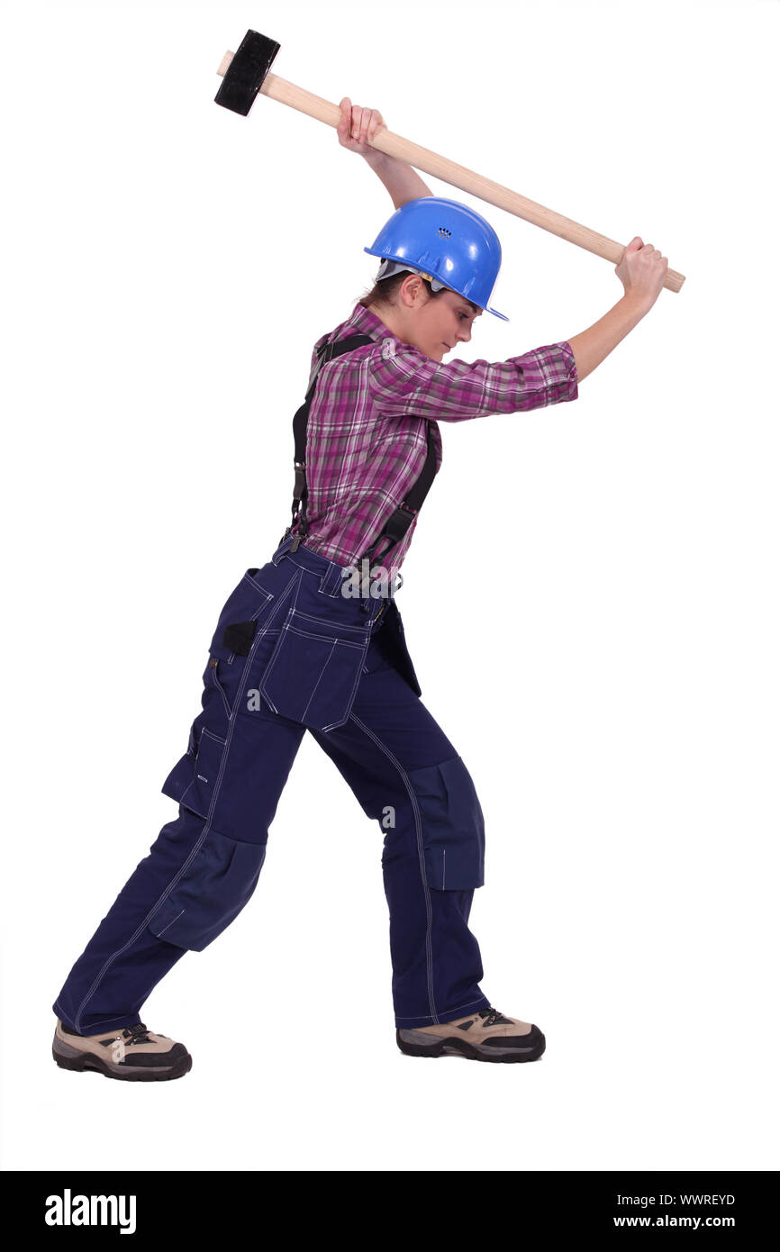 Woman with hammer Stock Photo - Alamy