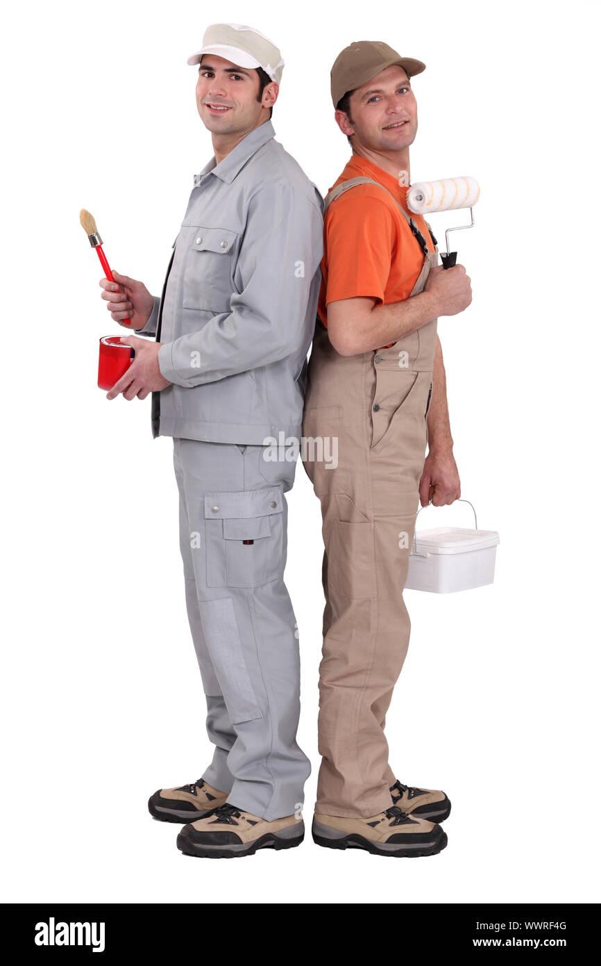 Two painters back to back Stock Photo - Alamy