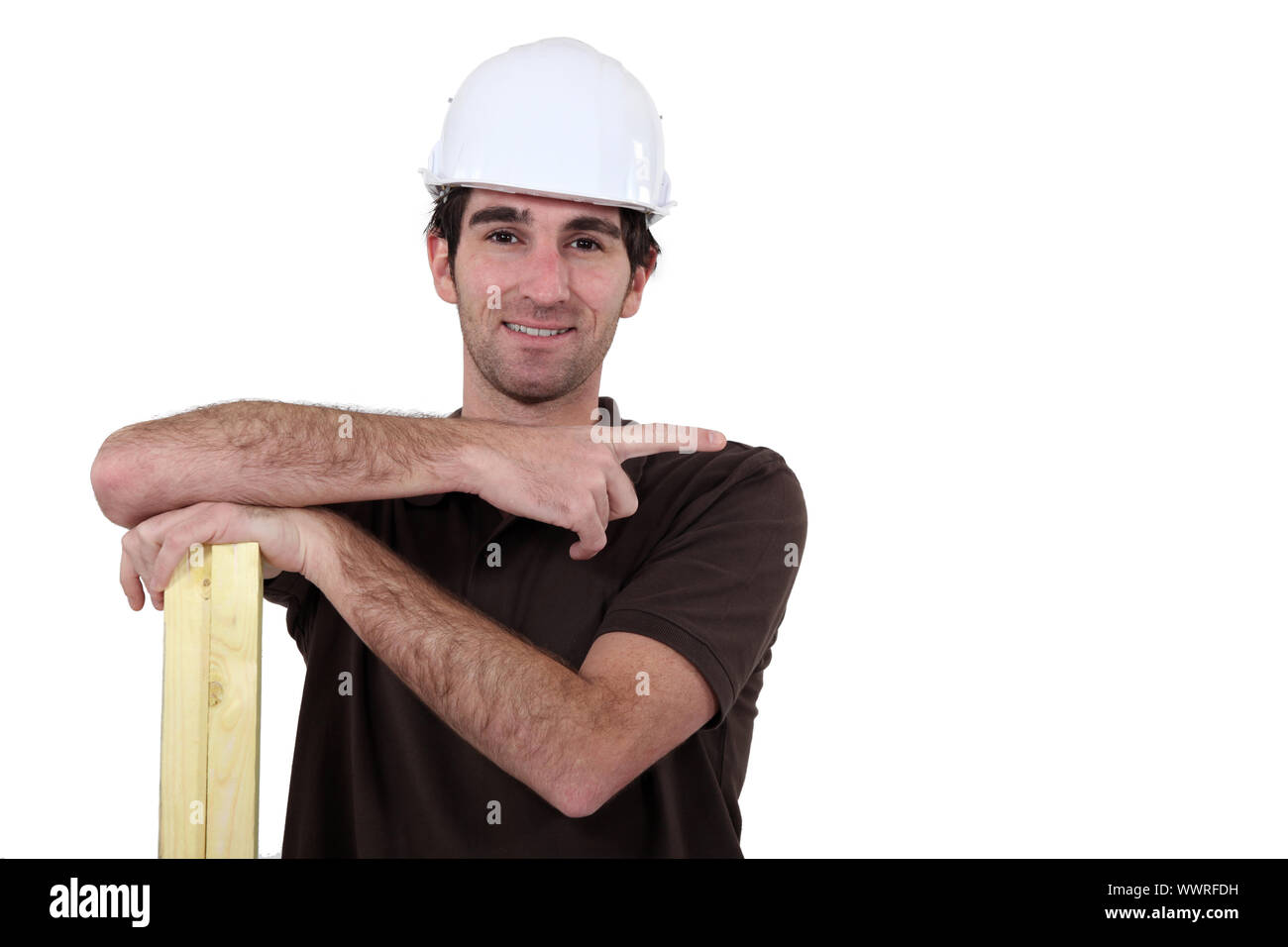 Carpenter pointing to empty copyspace Stock Photo - Alamy