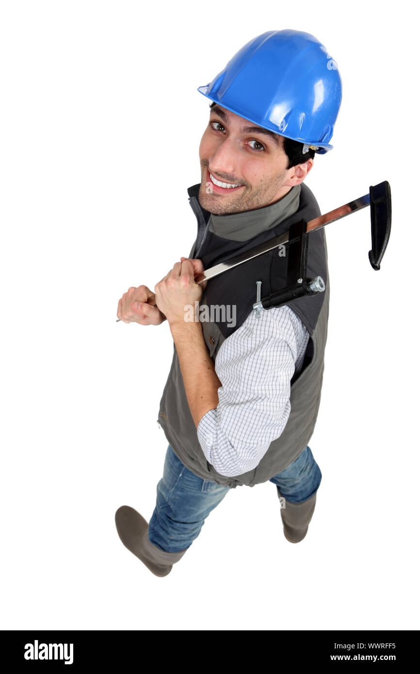 Man stood with clamp Stock Photo - Alamy