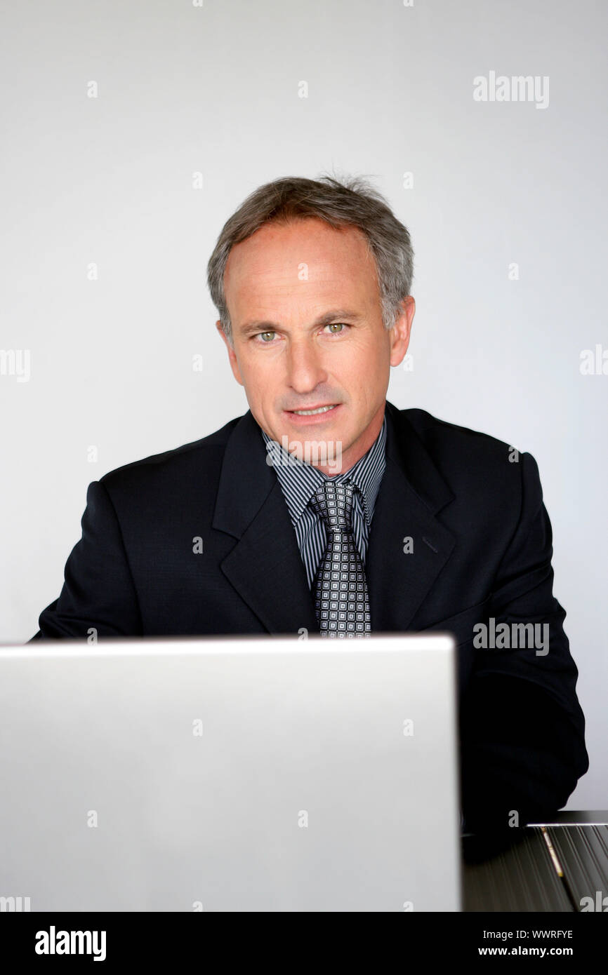 Man sat at computer old hi-res stock photography and images - Alamy