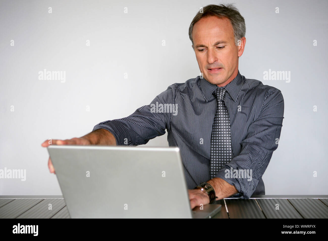Man with a laptop Stock Photo - Alamy