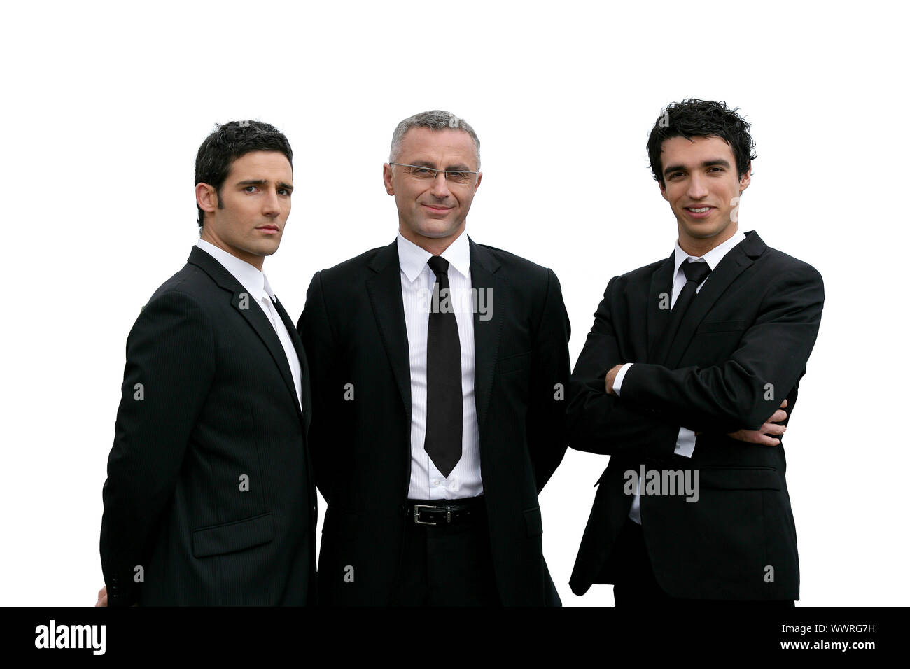Three confident businessmen on white background Stock Photo - Alamy