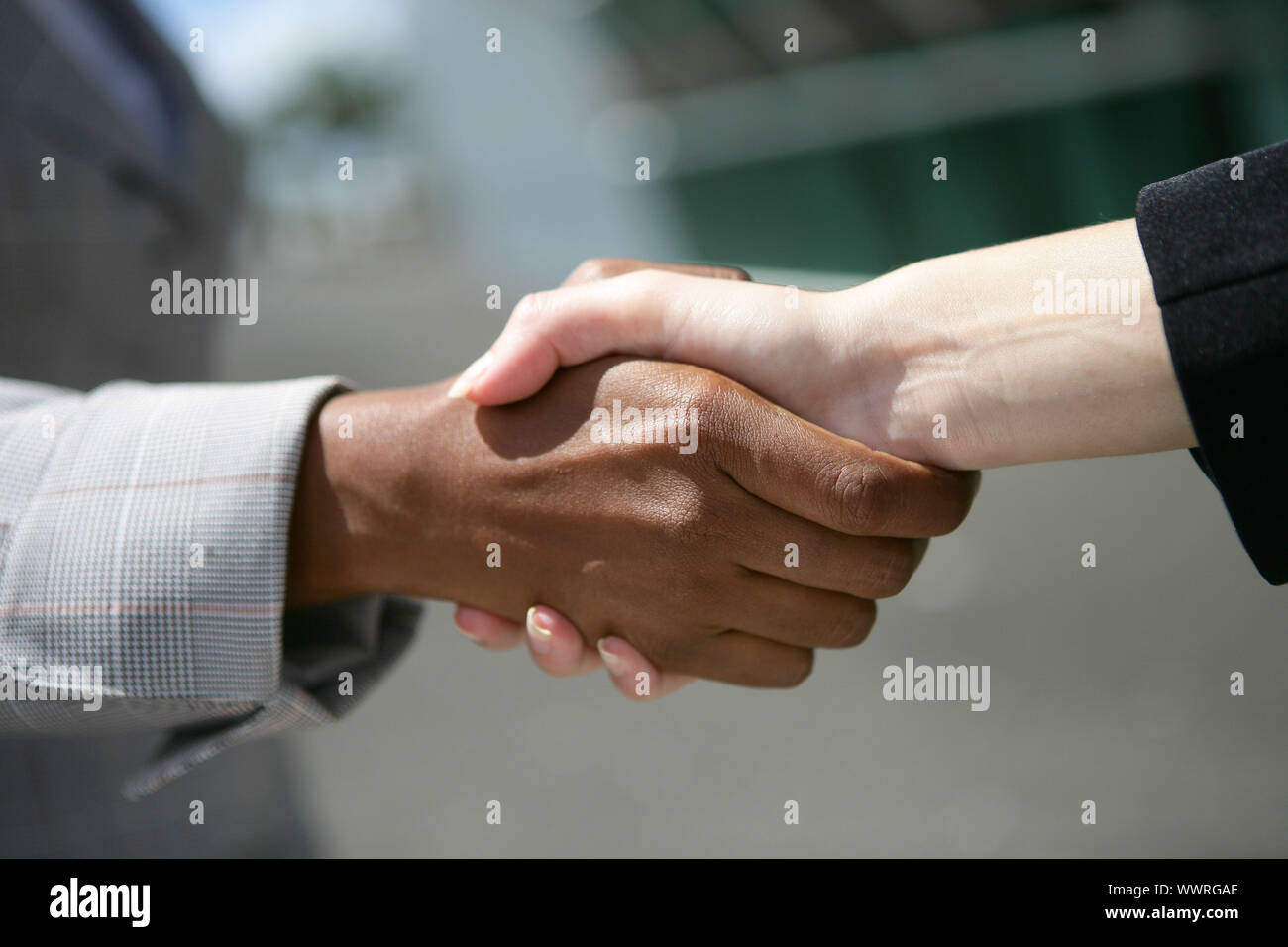 Interracial business hand shake hi-res stock photography and images - Alamy