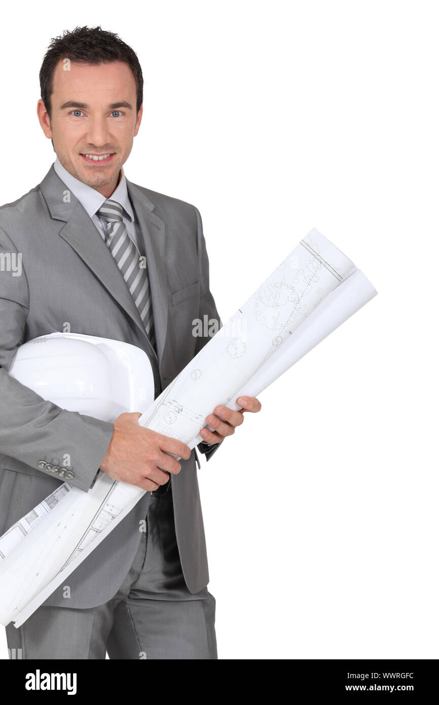 Architect holding plans Stock Photo - Alamy