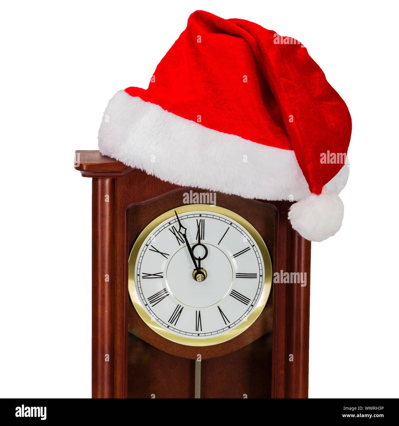 Wall clock and cap of Santa Claus, isolated on white background Stock ...