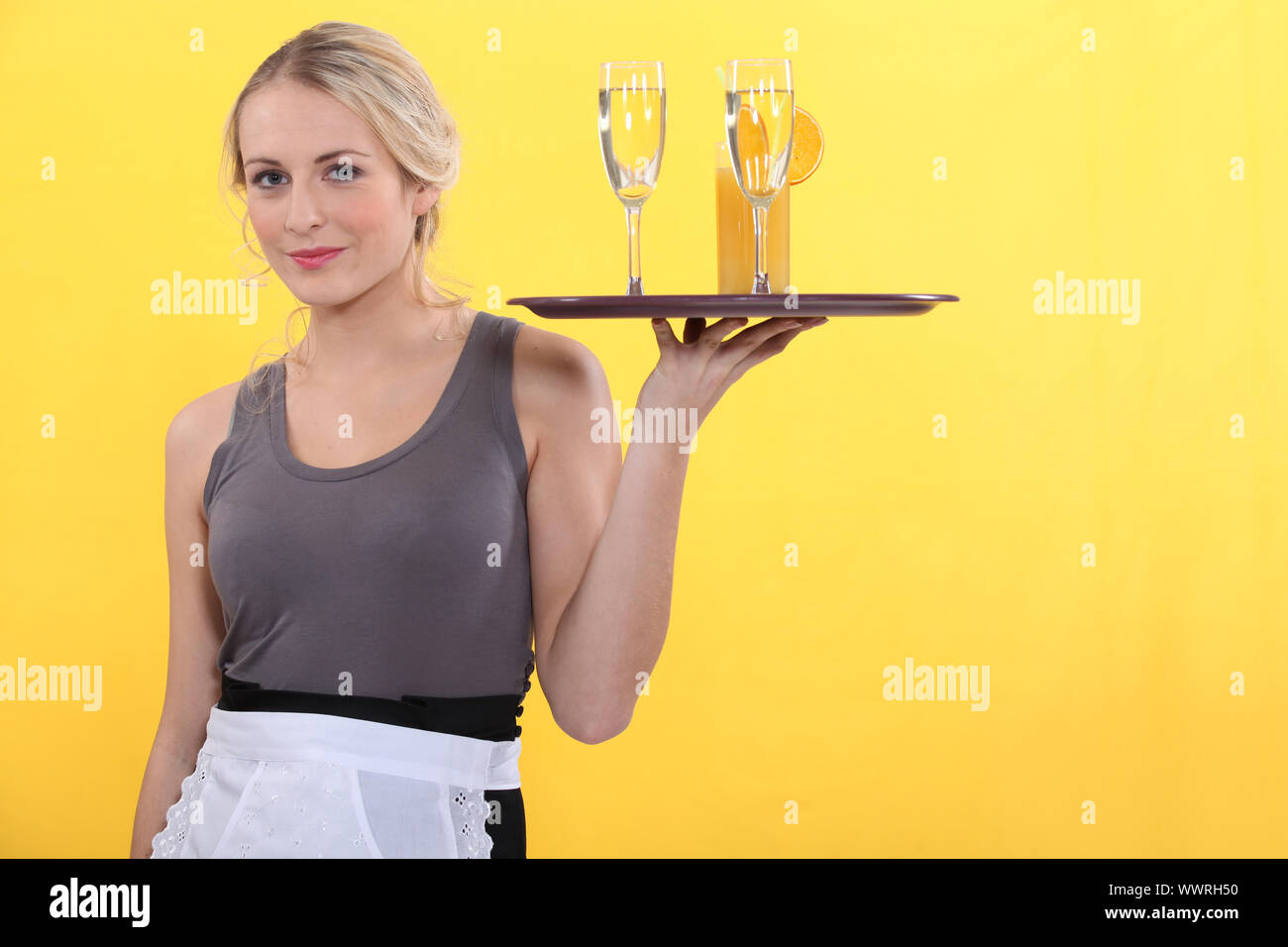 portrait of a waitress Stock Photo - Alamy