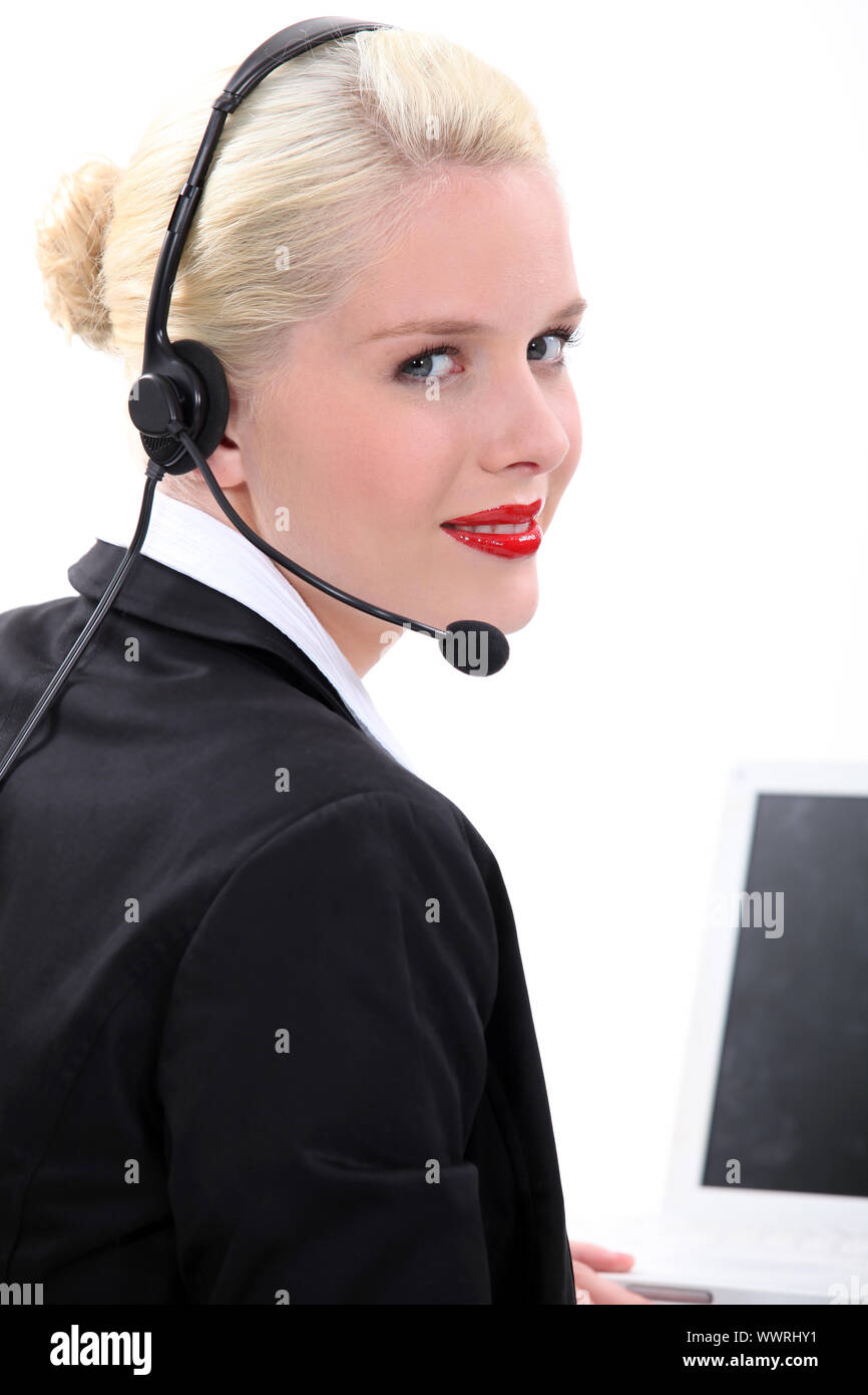 Blond administrative worker Stock Photo - Alamy