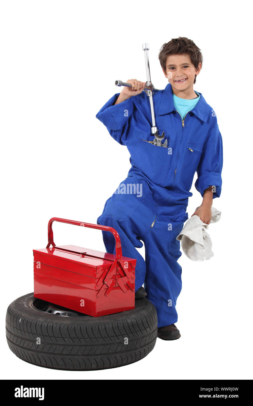 Young boy dressed as a mechanic Stock Photo - Alamy