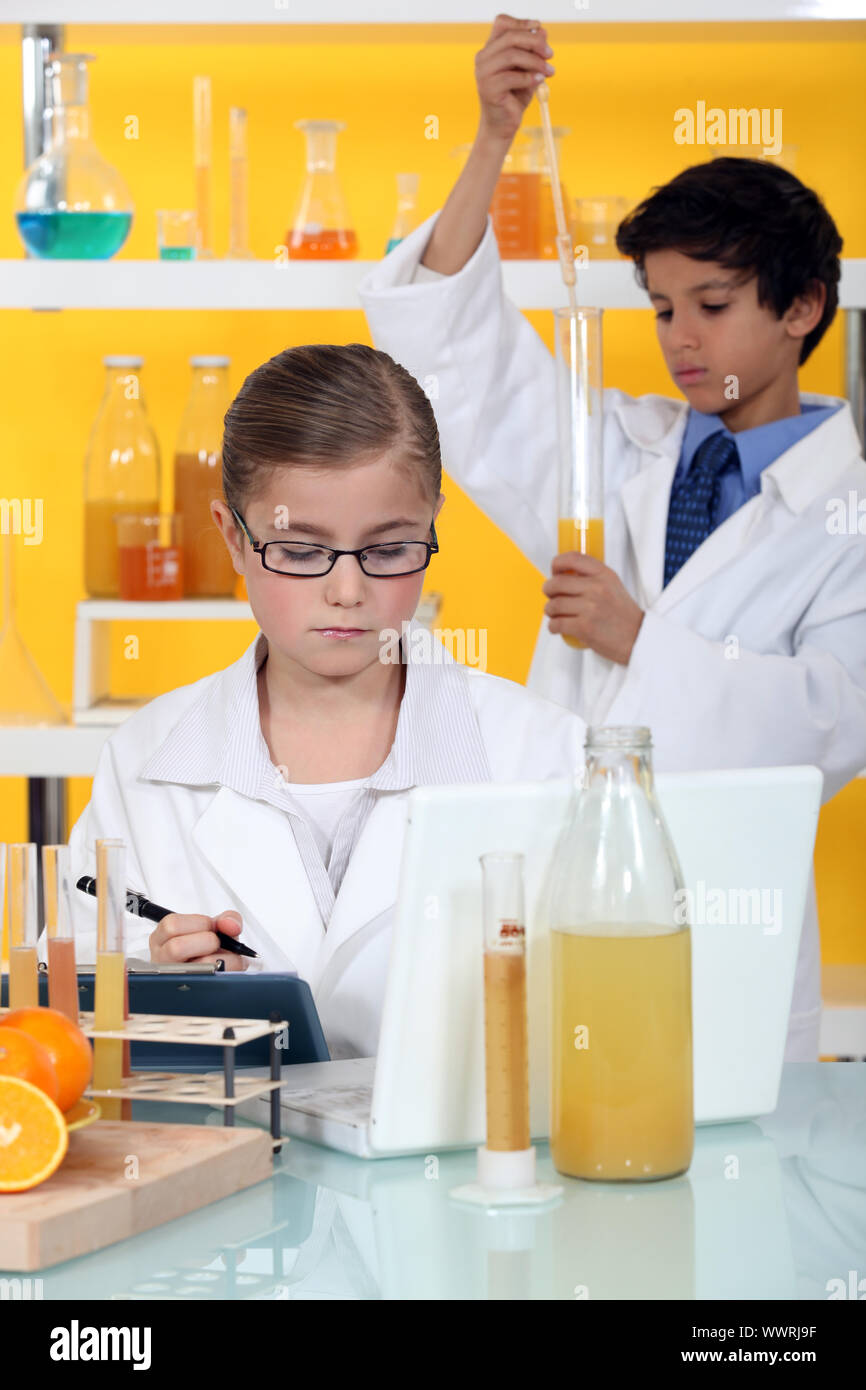 Children conducting an experiment Stock Photo - Alamy