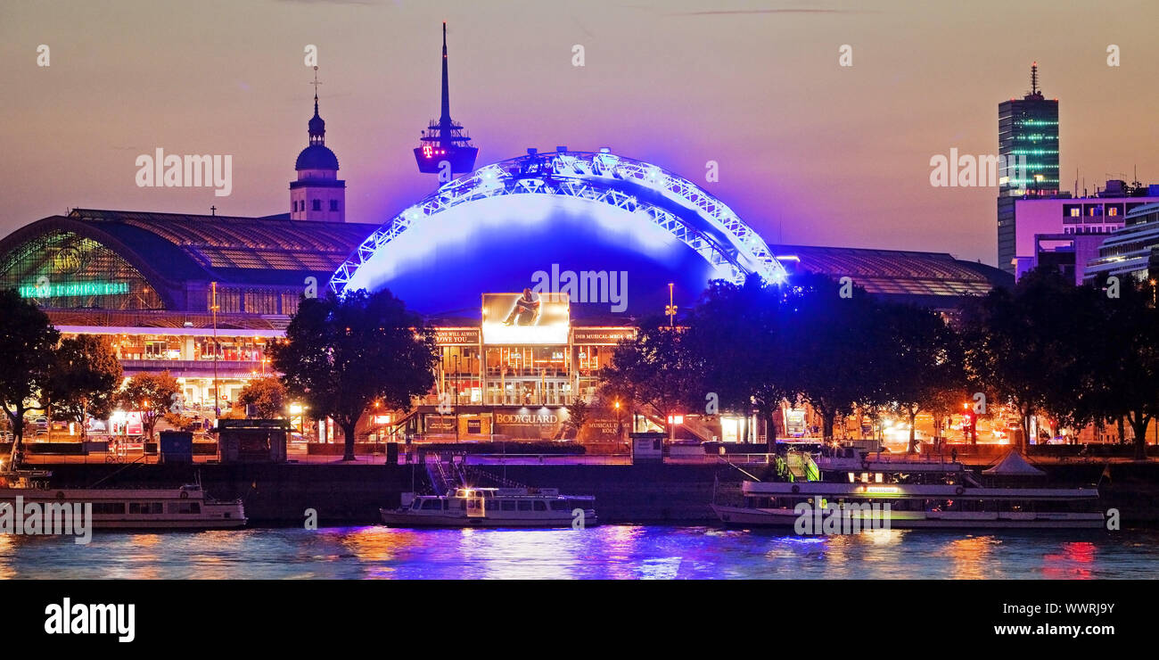 city panorama with central station, river Rhein and Musical Dome in the ...