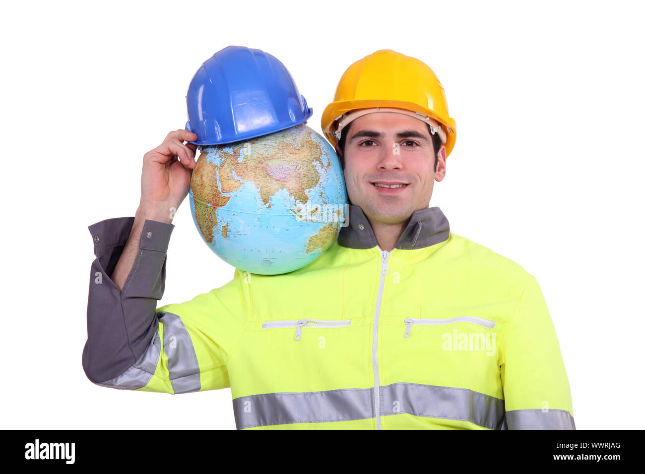 Worker with globe on his shoulder Stock Photo - Alamy