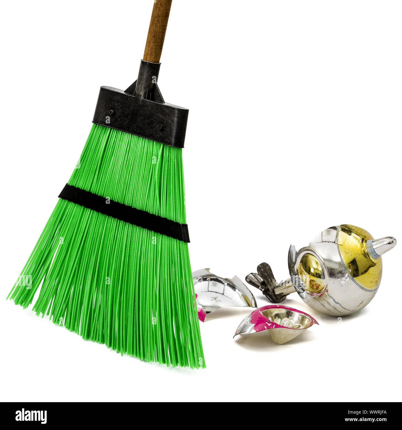 Balayage of broken Christmas decorations with the help of a broom ...