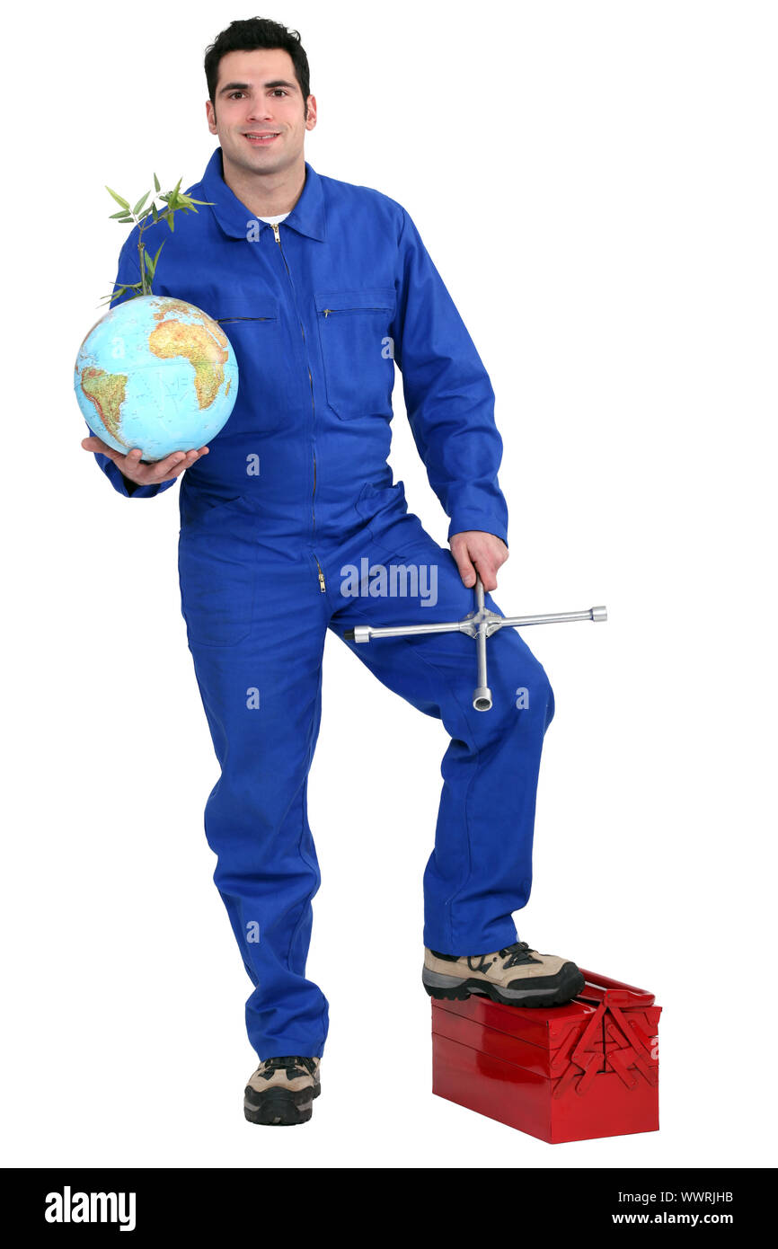 Mechanic holding tool-box Stock Photo - Alamy