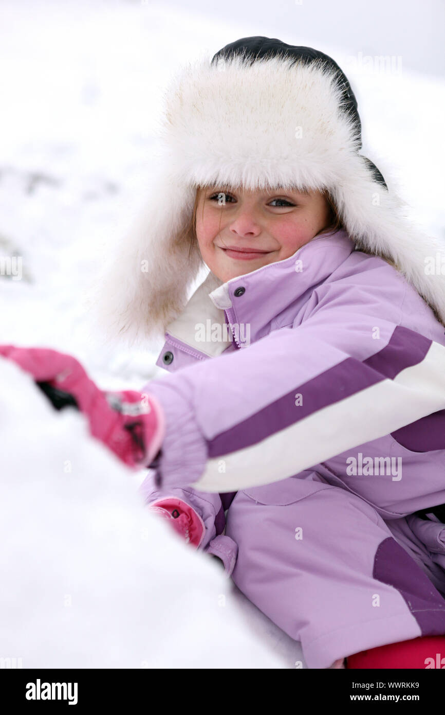 portrait of little girl at ski resort Stock Photo - Alamy