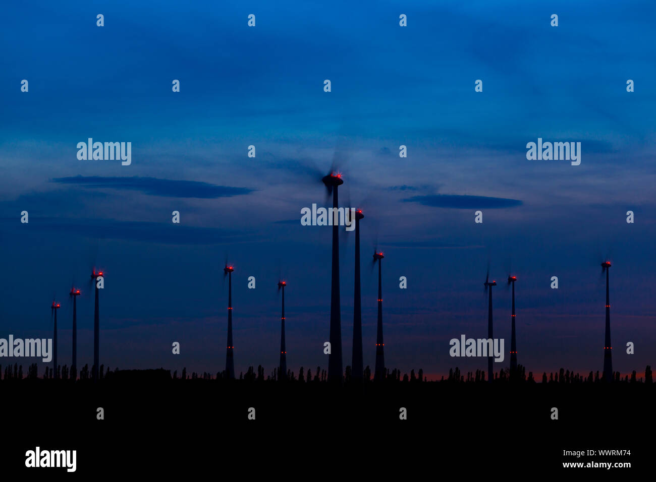 Wind turbine at night Stock Photo - Alamy