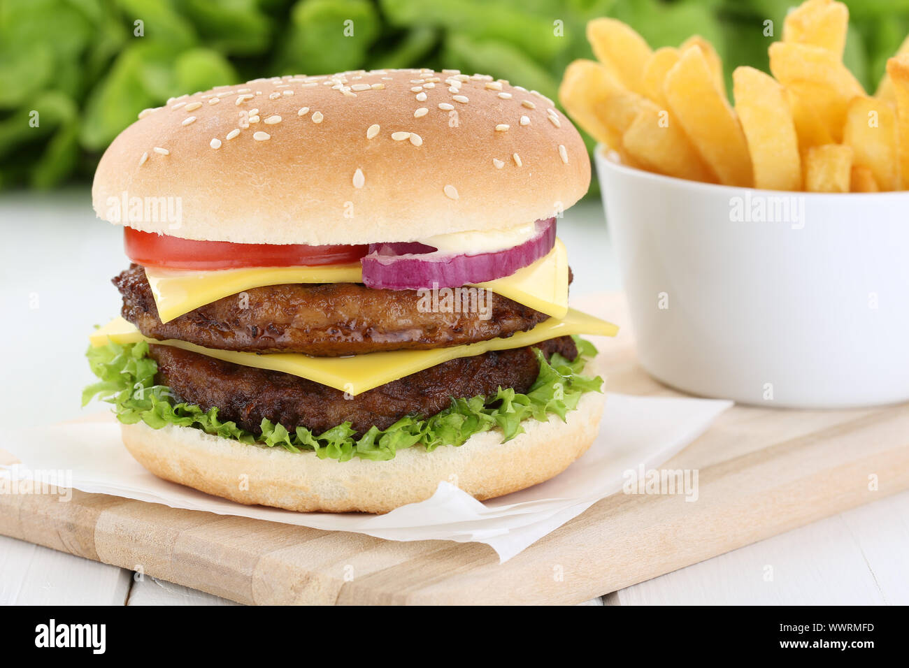 Double Cheeseburger Hamburger with French fries Stock Photo - Alamy