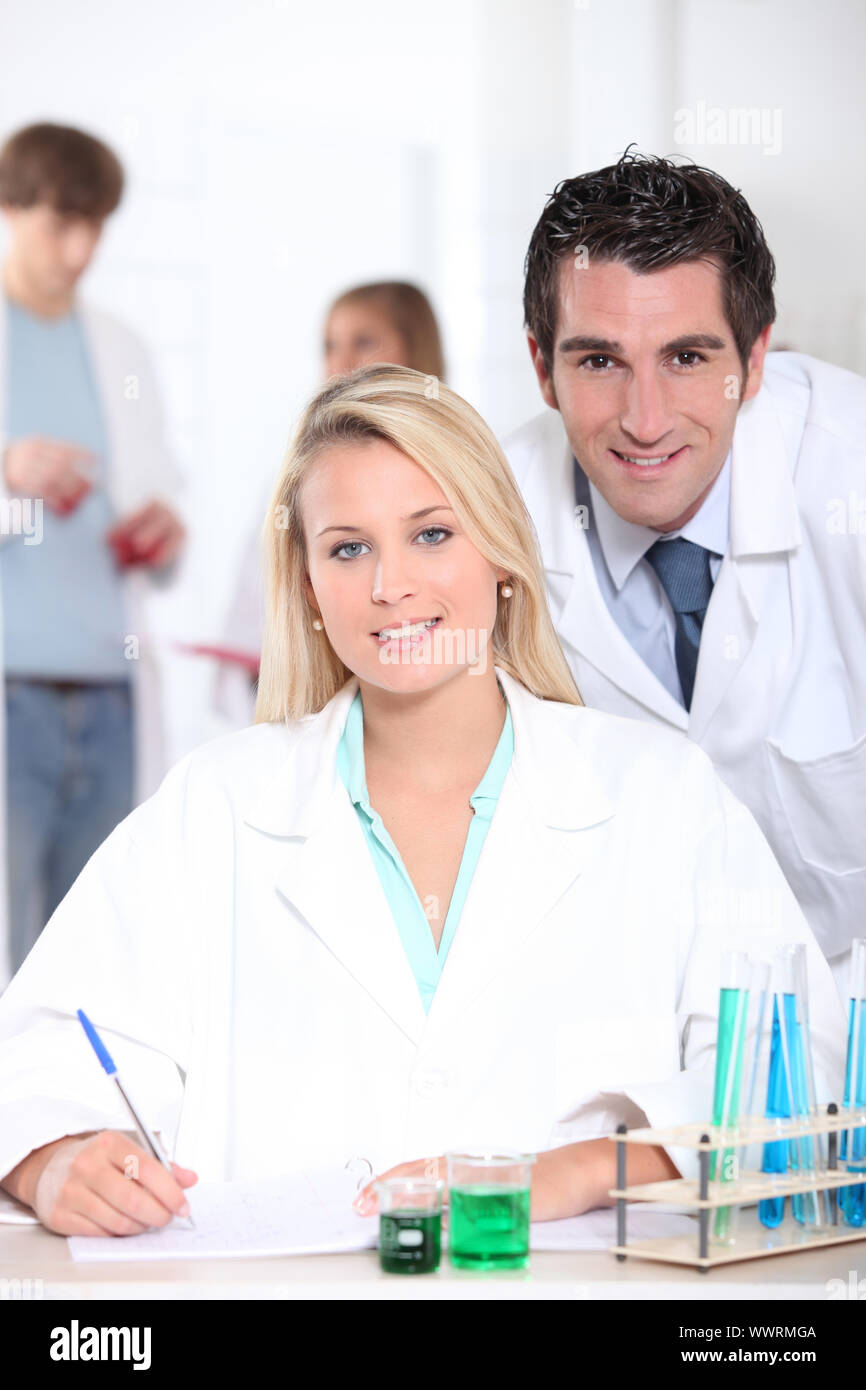Teacher and student in the laboratory Stock Photo - Alamy