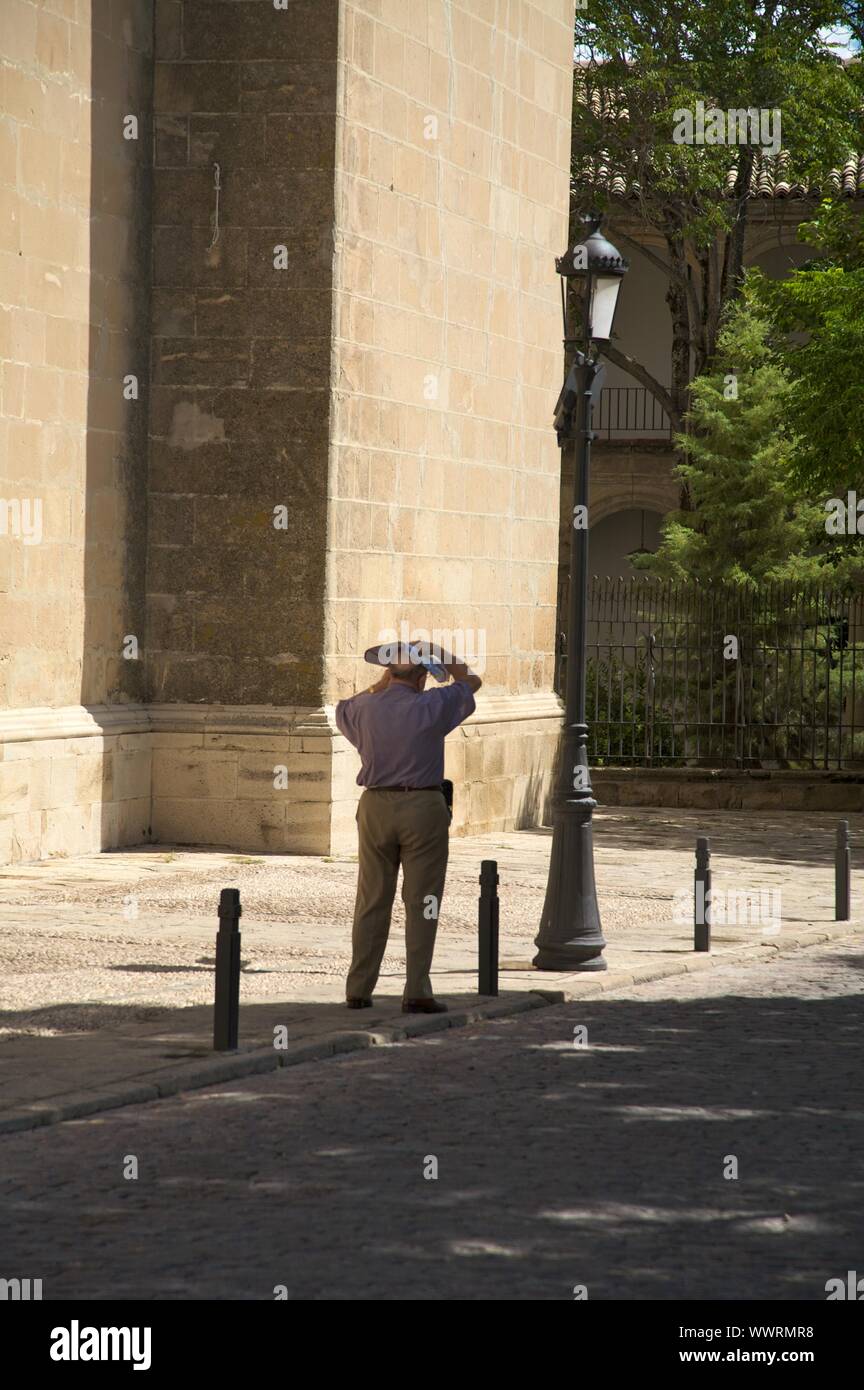 backwards of a man with a map on his head Stock Photo - Alamy