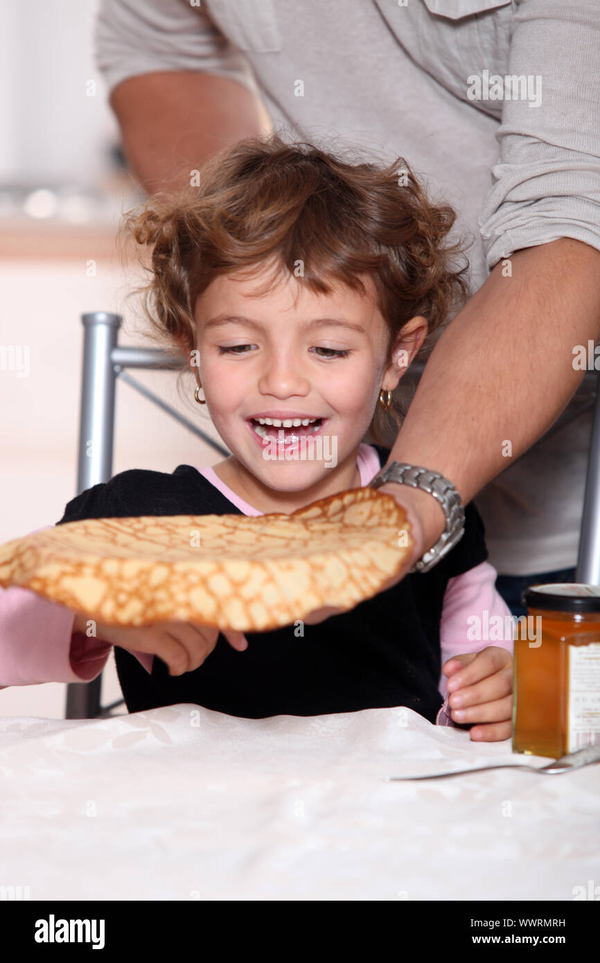 greedy little girl Stock Photo - Alamy