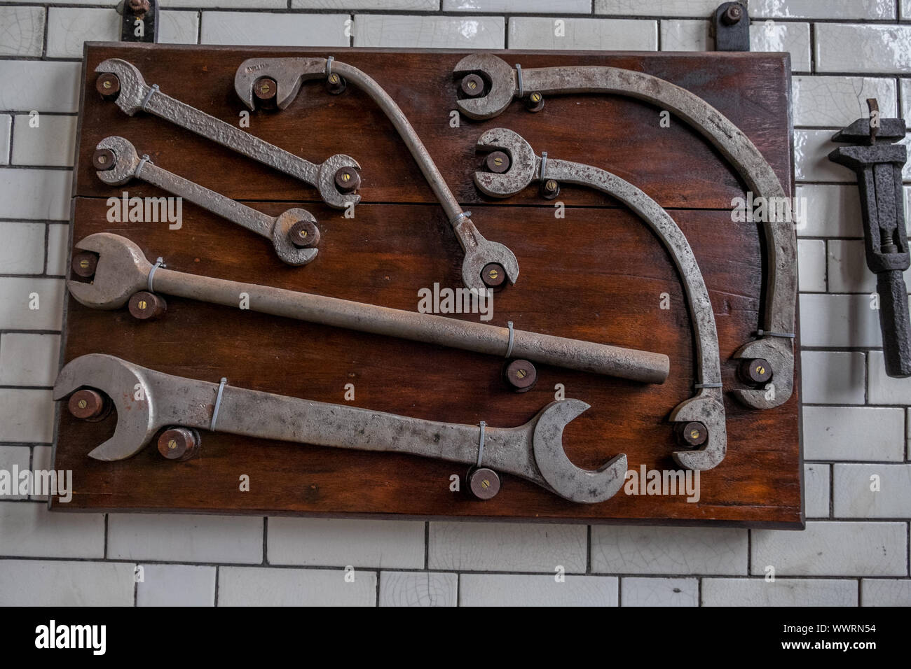 Various sized spanners and assorted tools in engineers workshop Stock ...