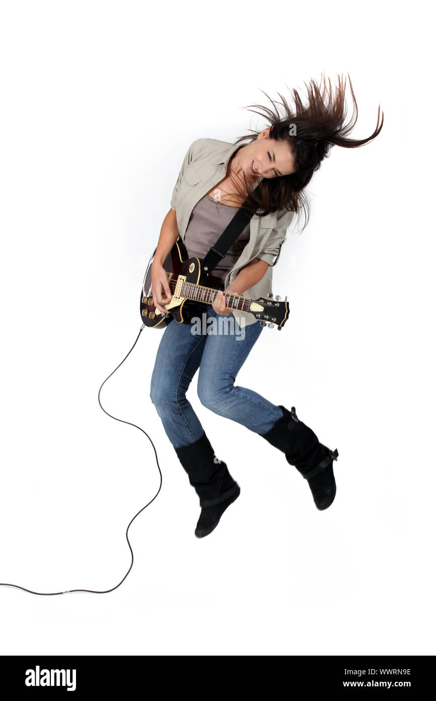 Girl rocking the guitar Stock Photo - Alamy