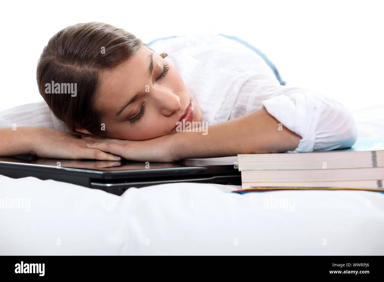 Sleeping over her books hi-res stock photography and images - Alamy