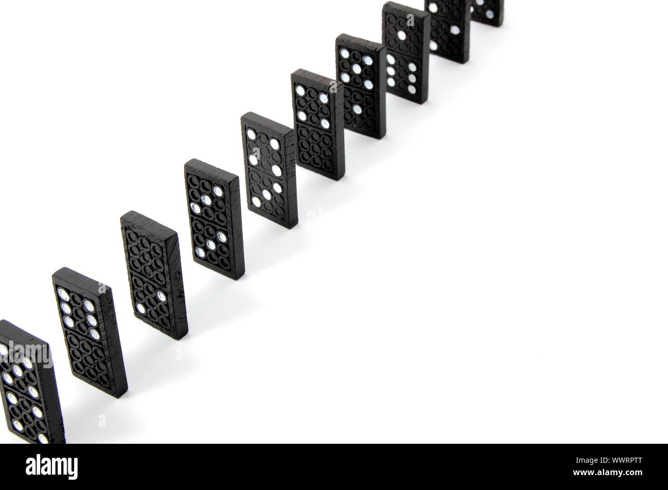 chain of dominoes isolated on a white background Stock Photo - Alamy