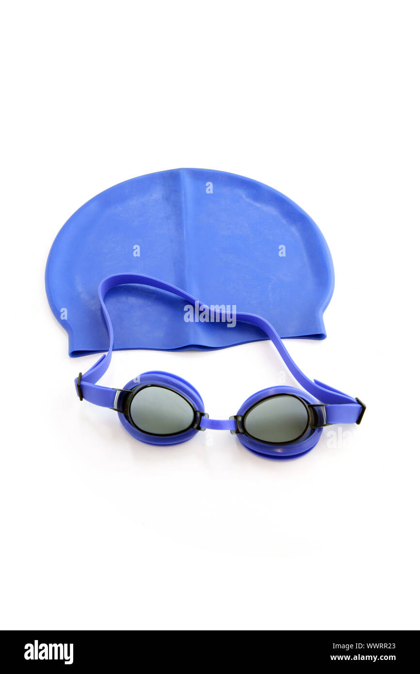 Blue swimming cap and goggles Stock Photo - Alamy