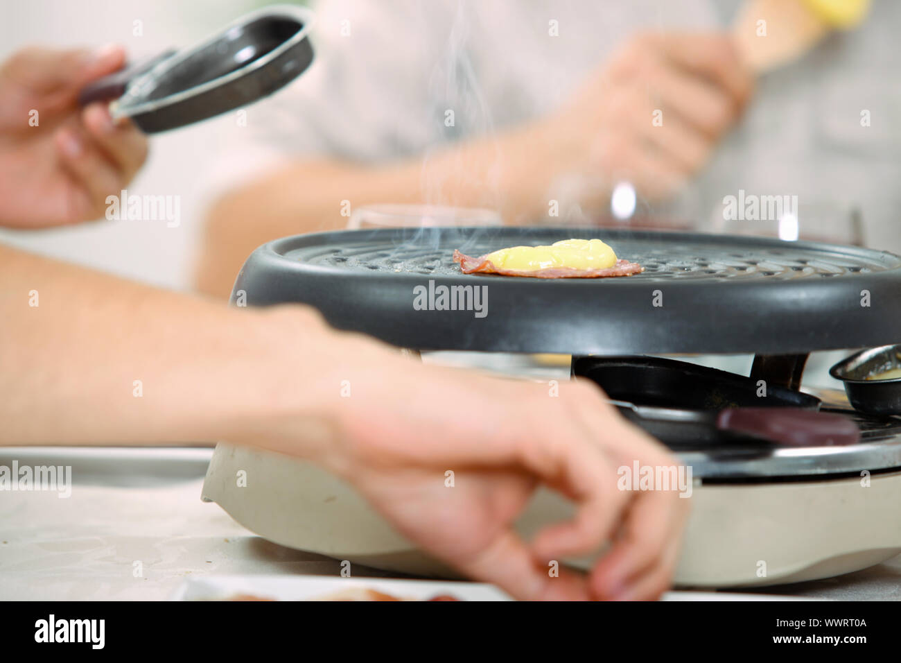 modern electric raclette grill Stock Photo - Alamy